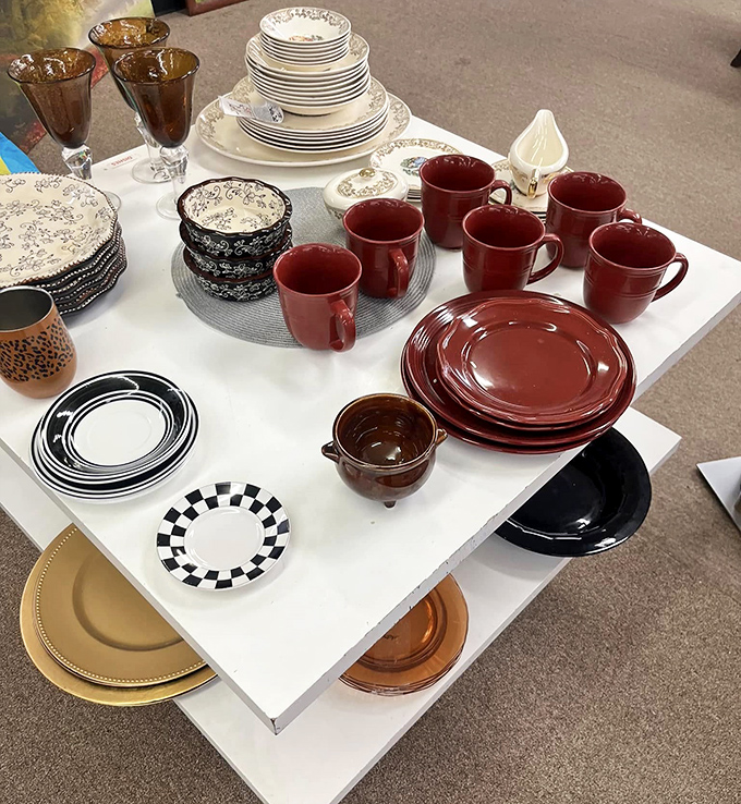 A tabletop symphony of dinnerware where mismatched becomes charming and vintage patterns tell stories of dinner parties past.