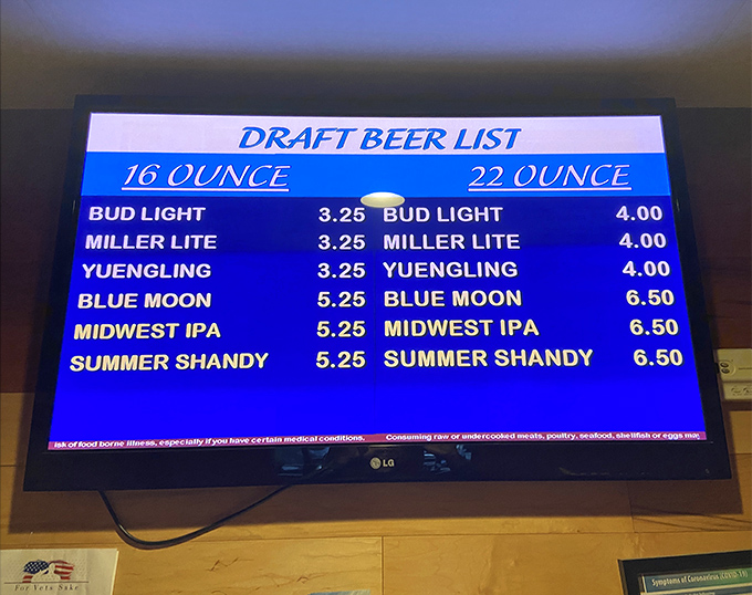 Draft beer options displayed proudly, from Bud Light to craft selections, democracy in liquid form.