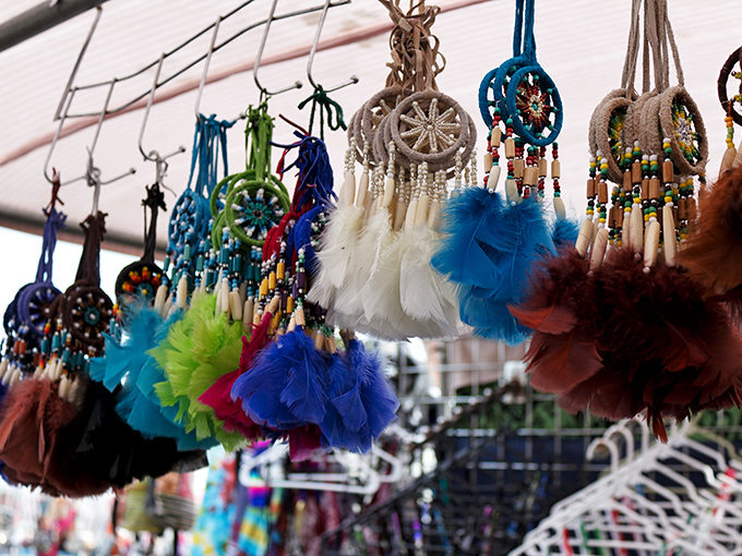Dreamcatchers dancing in the market breeze &ndash; part folk art, part spiritual tool, and entirely mesmerizing as they twirl above the shoppers.