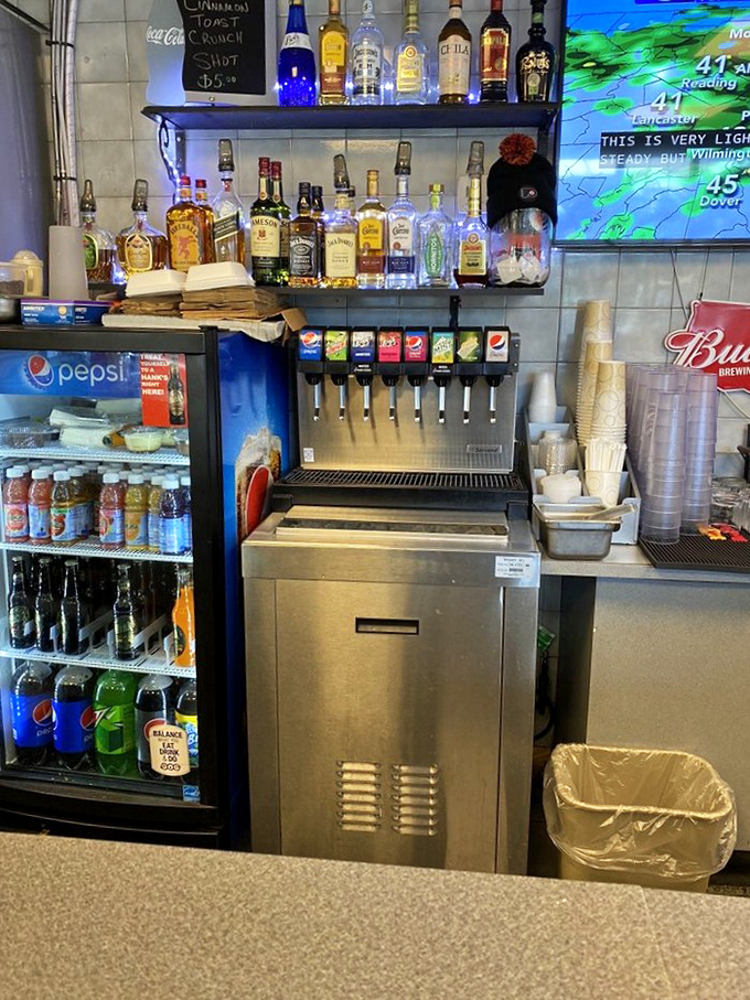 A well-stocked beverage station ready to quench any thirst after you've conquered that magnificent cheesesteak masterpiece.
