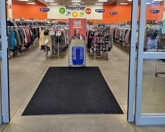 The entrance beckons with promise. That "50% Off Sale" sign might as well say "Abandon all budget restraint, ye who enter here."