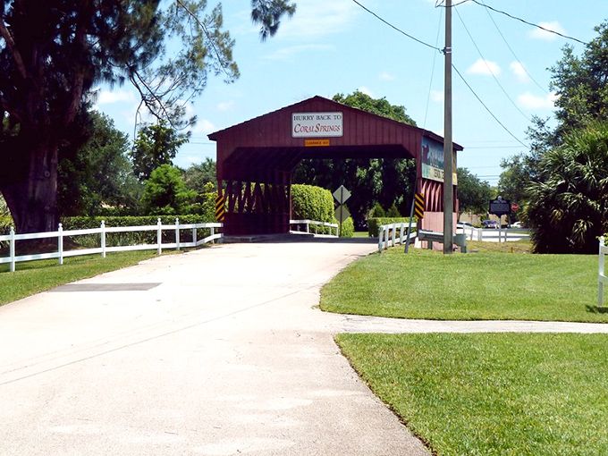 The approach to the bridge offers a picture-perfect view, framed by white fences and lush greenery&mdash;Florida's version of a Norman Rockwell scene. 