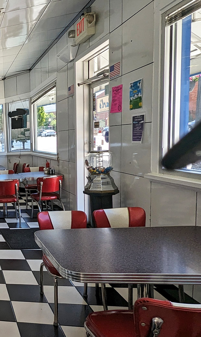 Even the exit view at Carl's feels nostalgic, with classic red and white chairs standing ready for the next shift of hungry patrons seeking comfort on a plate.