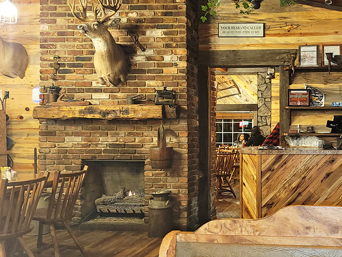 That mounted deer watches over diners like a woodland guardian, silently approving your decision to order the catfish.