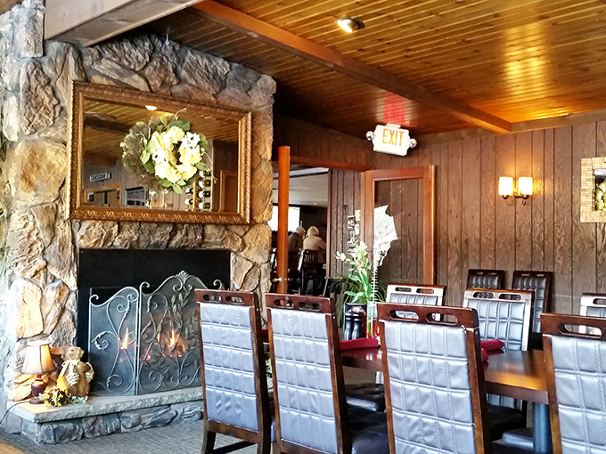 That stone fireplace has witnessed more toasts than a wedding reception hall.