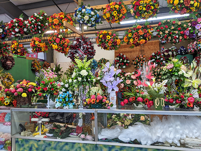 This explosion of floral artistry transforms artificial arrangements into something surprisingly emotional&mdash;proof that beauty finds a way, even in silk and plastic.