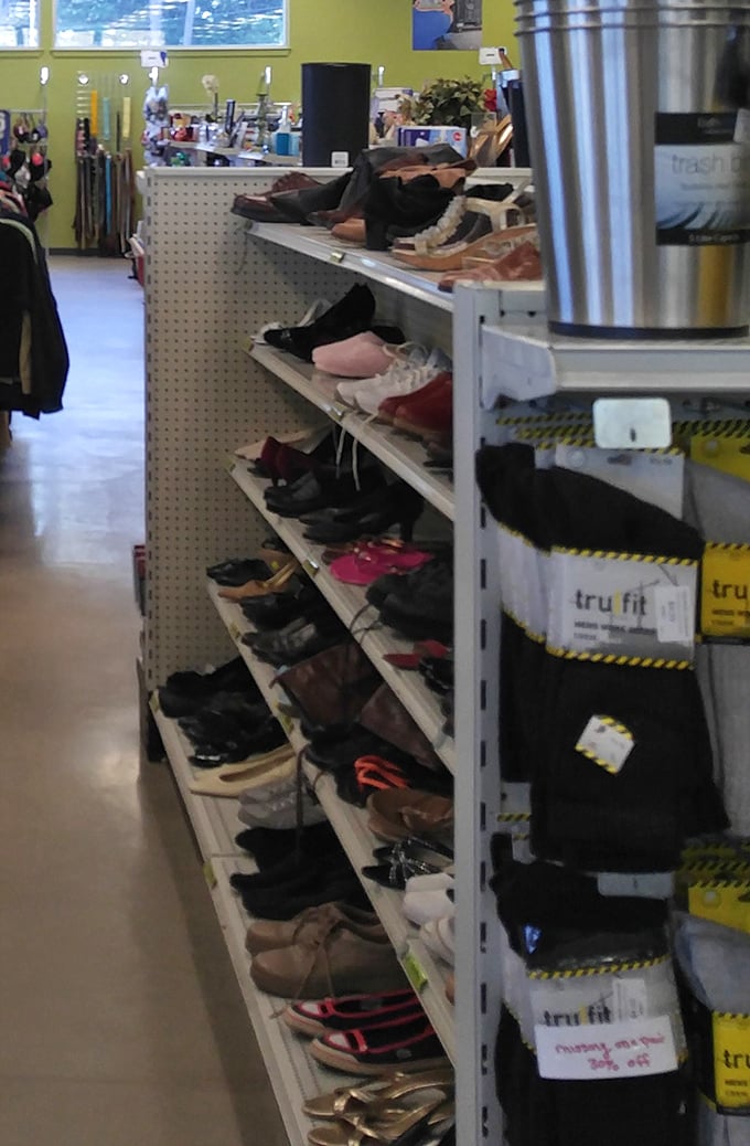 The shoe section: a footwear archaeological dig where vintage heels, barely-worn sneakers, and the occasional designer find await their Cinderella moment.