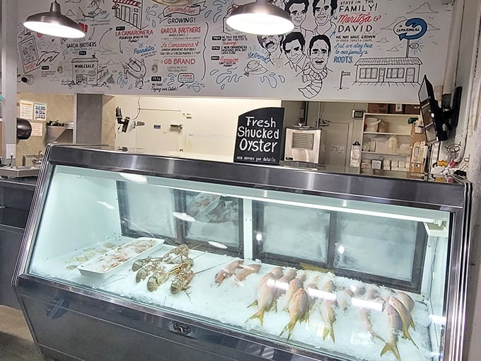 The fish market display case&mdash;where tomorrow's specials wait their turn. Like a seafood runway where the freshest catches strut their stuff.
