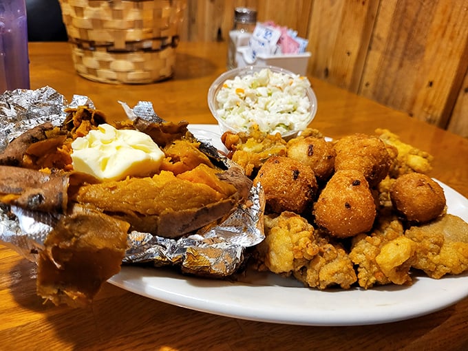 A plate that answers the eternal question: "Why choose between steak and seafood?" The fried oysters and loaded potato make diplomacy delicious.