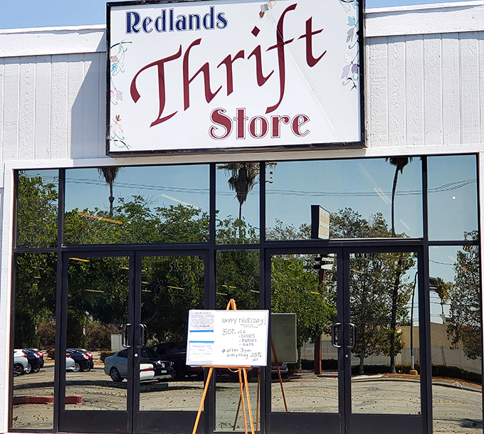 The storefront's clean lines and palm tree reflections offer a quintessentially Southern California welcome to bargain hunters and collectors alike.