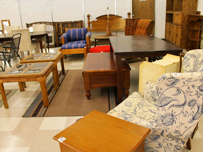 The furniture section resembles a living room family reunion, with pieces from different eras mingling comfortably, waiting for adoption into new homes. 