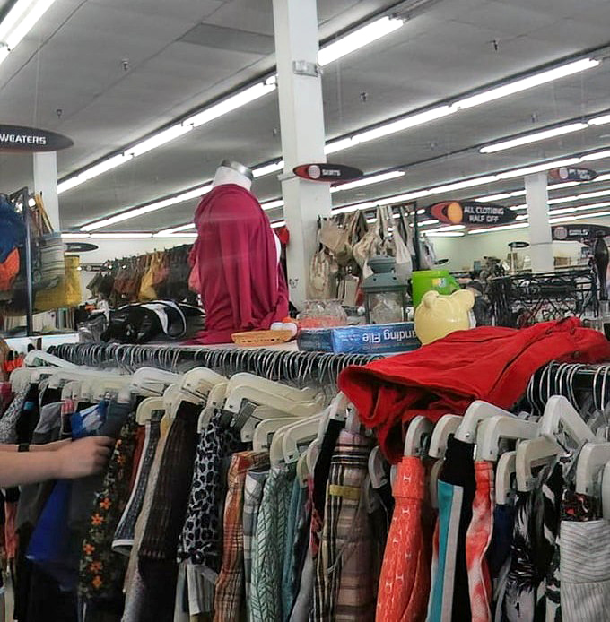 Men's suits and sport coats lined up like job candidates. These second-chance blazers are ready to impress at your next interview or dinner party.