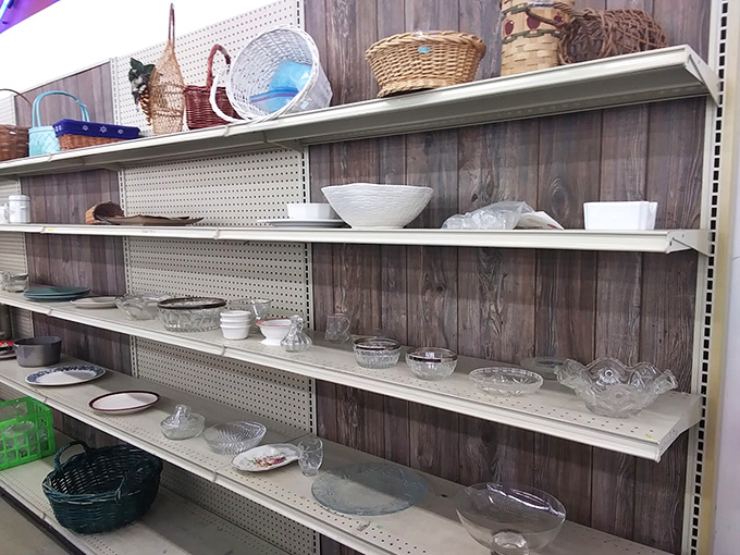 Crystal, glass, and ceramic serving pieces waiting for their next dinner party debut. That cut glass bowl screams "fancy fruit salad container."
