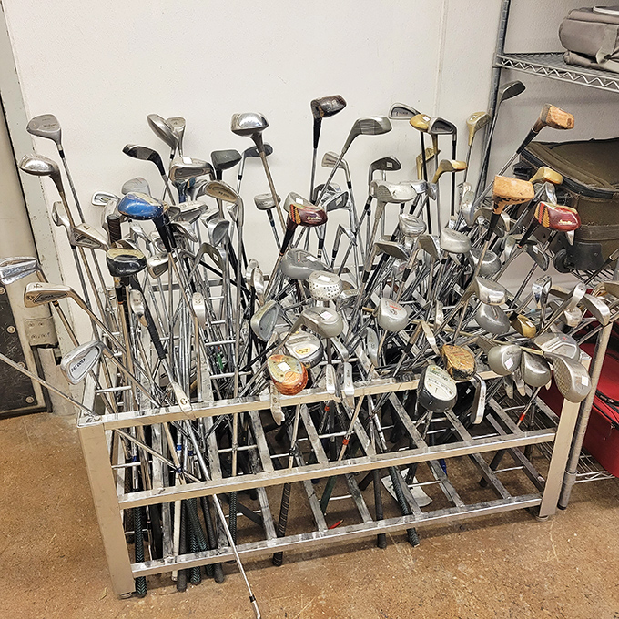 Golf club forest! Enough putters, drivers, and irons to equip an entire country club, all priced less than a single round at a fancy course.