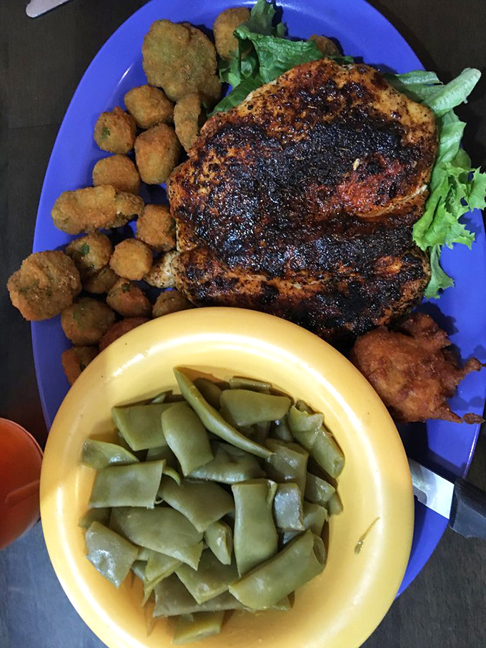 This isn't just grilled chicken&mdash;it's a Southern feast with perfectly seasoned meat, fried okra nuggets, and green beans cooked with respect.