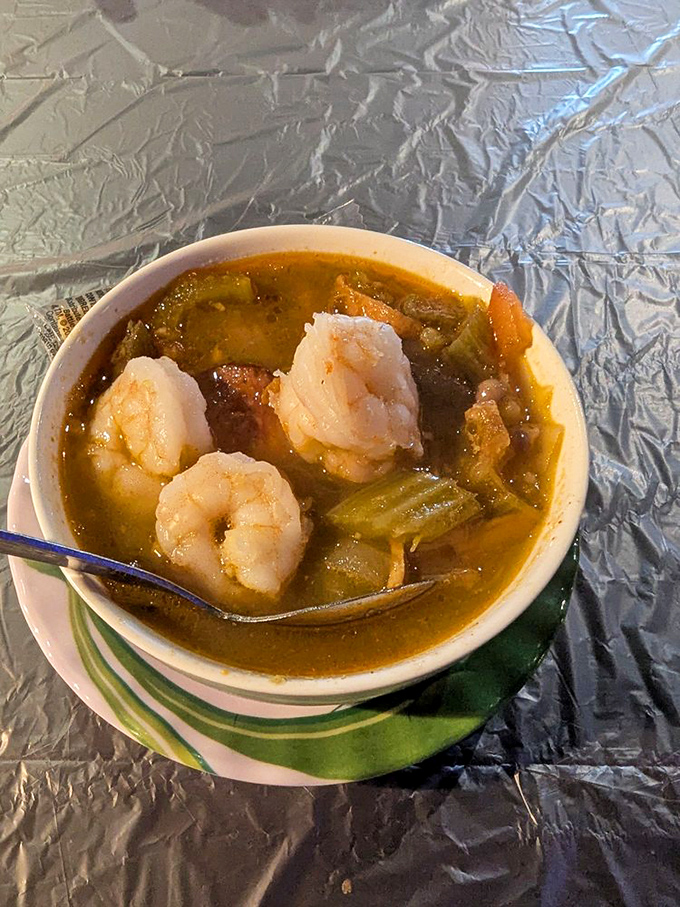 This isn't just gumbo&mdash;it's a bowl of Louisiana heritage with plump shrimp floating like treasures in a rich, roux-darkened sea.