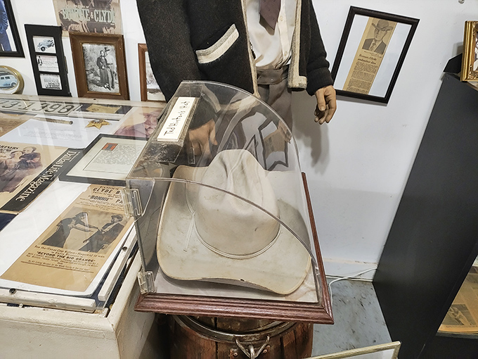 Bonnie Parker's iconic hat under glass &ndash; the fashion accessories of America's most famous female outlaw still captivate visitors nearly a century later. 