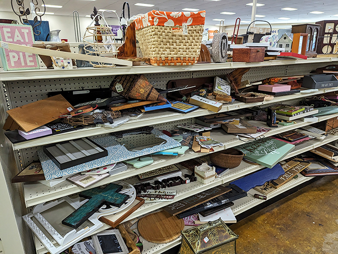 Home d&eacute;cor shelves&mdash;a mismatched symphony of picture frames, baskets, and signs that once adorned someone else's walls.