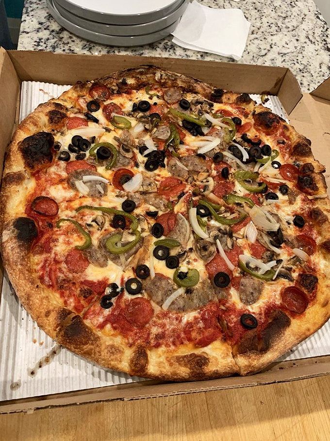 The house special pizza that throws a party and invites every topping worth knowing. Vegetables and meats living together in perfect harmony.