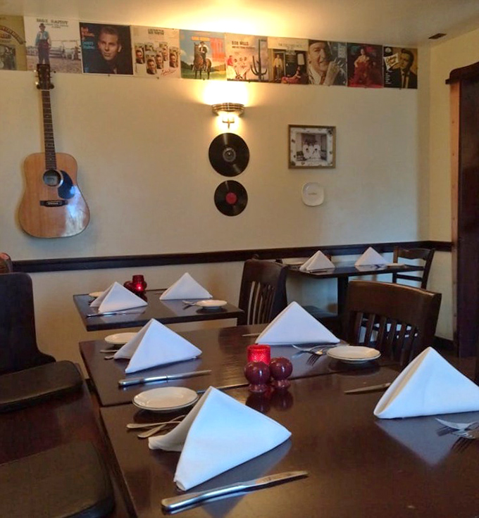 Vinyl records and acoustic guitars on the wall&mdash;because great meals, like great songs, stay with you long after the last note.