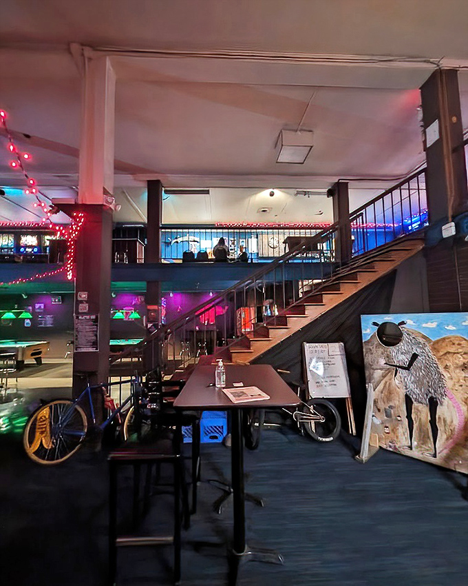 The stairway to heaven might actually be this arcade-flanked path to the second floor, where pinball wizards and ramen enthusiasts find common ground.
