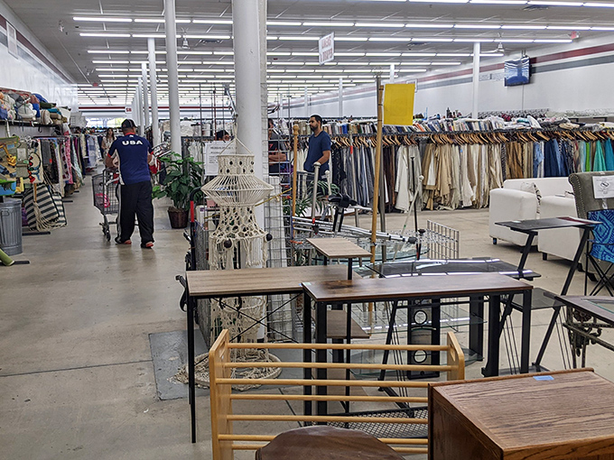 Furniture finds and clothing treasures coexist in perfect harmony, with staff members carefully organizing the constant influx of new donations.