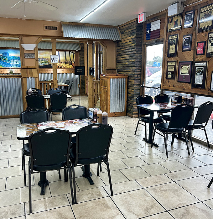 Awards line the walls like a barbecue hall of fame. Not decoration&mdash;documentation of a serious commitment to meat mastery.