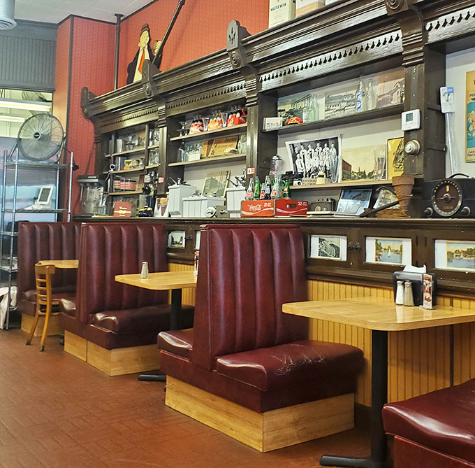 Those burgundy booths have witnessed more of Vermilion's history than any history book. If vinyl could talk, these seats would have bestselling memoirs.