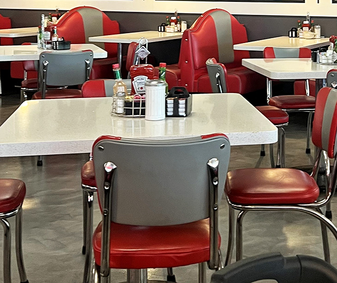 Classic diner seating that invites you to settle in and stay awhile, where every table feels like the best seat in the house.
