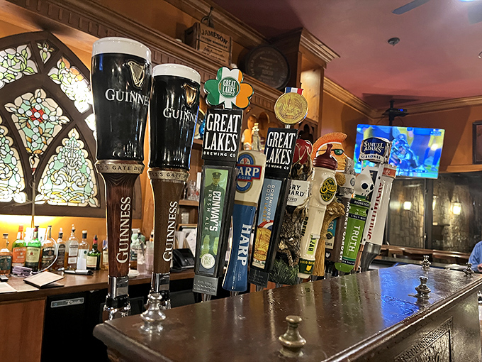 That ceiling mural transforms a simple hallway into something magical, like walking through an illuminated Celtic manuscript.