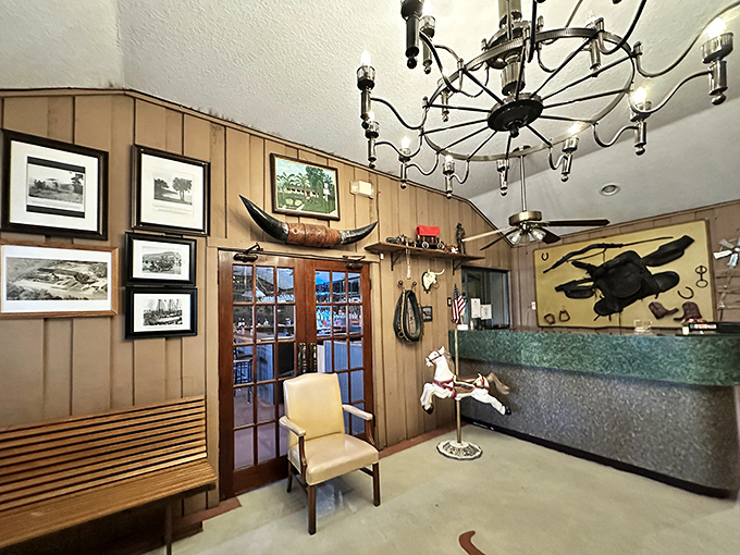 The reception area's wood paneling and vintage photos tell stories of Tampa's past. That longhorn on the wall isn't decoration&mdash;it's a warning to other cows.