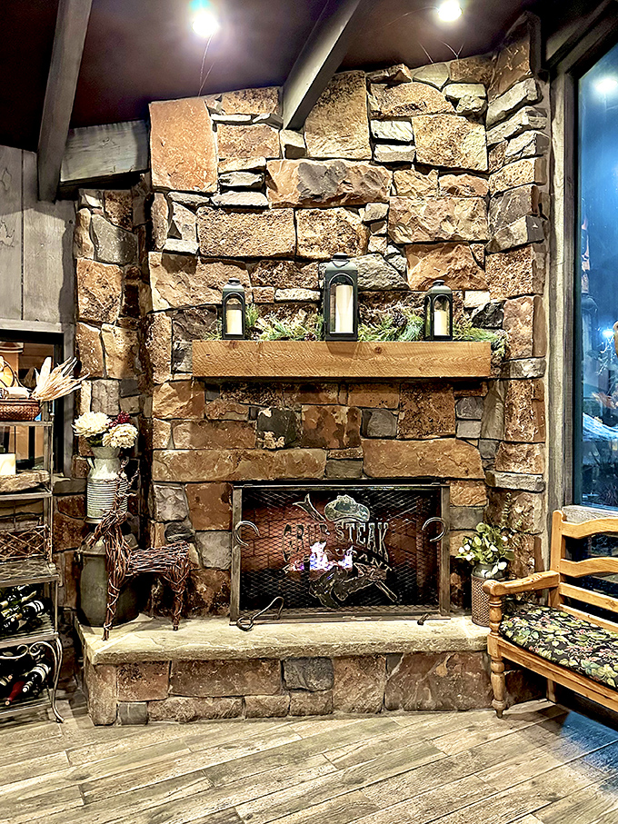 The stone fireplace isn't just decor&mdash;it's the beating heart of the restaurant, warming both the space and the spirits of winter-chilled diners.