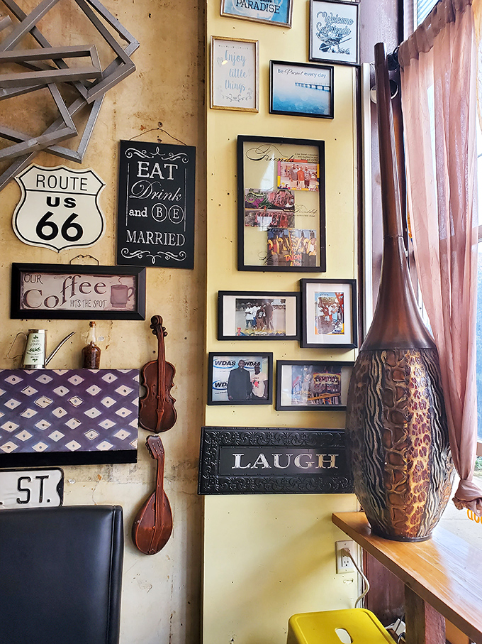 The wall decor reads like a scrapbook of good vibes—Route 66 signs, inspirational quotes, and musical instruments create a symphony of nostalgia.