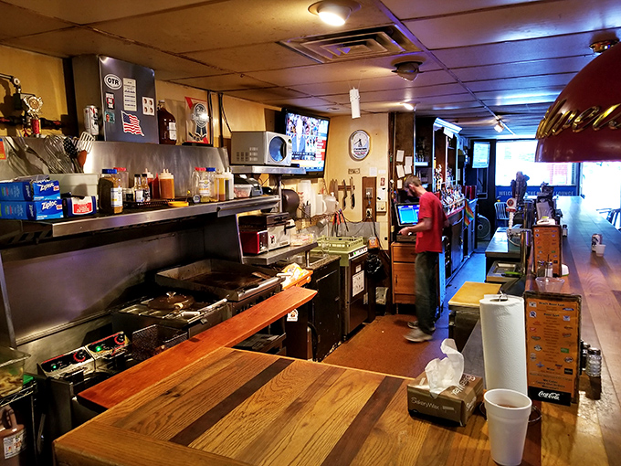 The kitchen pass &ndash; where burger dreams come true. That well-seasoned flat-top has more flavor memory than most culinary school graduates.