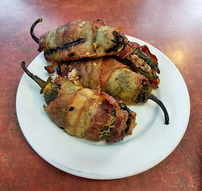 Wolf Turds – proof that whoever named these bacon-wrapped jalapeño poppers had a sense of humor as bold as their flavor.