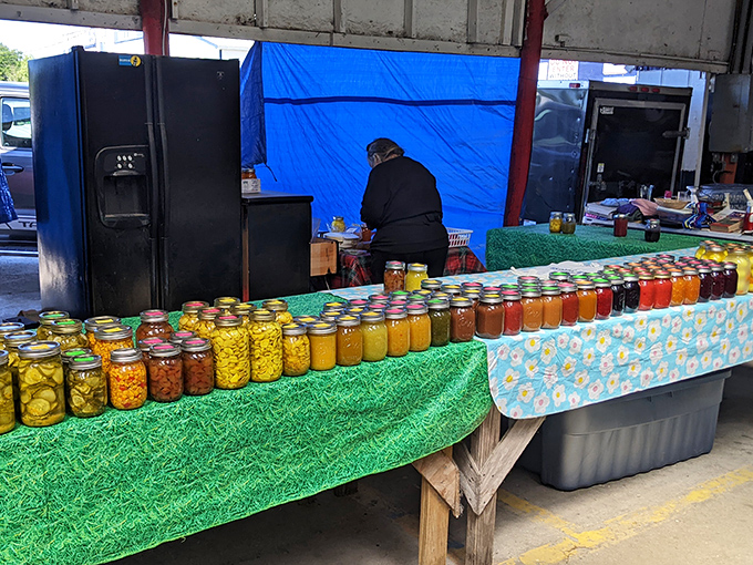 Mason jar masterpieces! These colorful preserved goods represent Florida's agricultural bounty and generations of family recipes captured in glass time capsules.