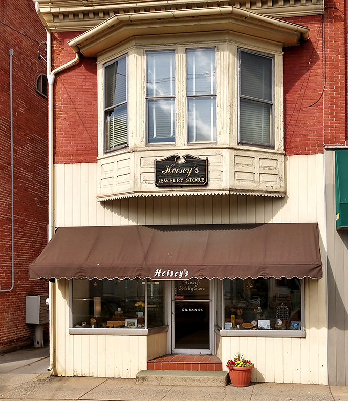 Henry's Jewelry Store, with its classic bay window and awning, feels like stepping into a time when purchases were made with careful consideration, not hasty clicks.
