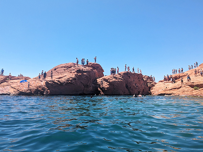 The famous jumping rocks where courage is measured in feet and seconds. Cliff diving with a backdrop worthy of a travel magazine cover.