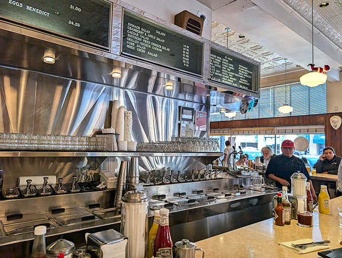 Open kitchen magic where skilled cooks work their craft with the confidence of seasoned Broadway performers.