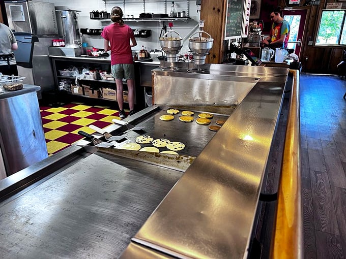 Where pancake magic happens. The griddle masters at work, transforming simple batter into edible New Hampshire postcards.