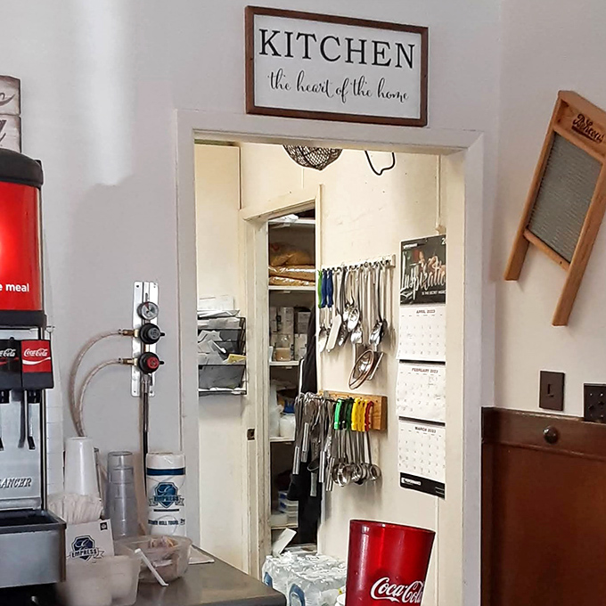 A sign proclaiming "Kitchen: the heart of the home" hangs above the doorway&mdash;a perfect summary of Belle's philosophy that good food creates family.