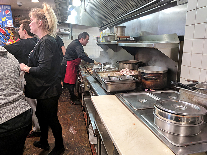 Behind the scenes, the kitchen crew orchestrates a sandwich symphony with the confidence that comes from decades of practice.