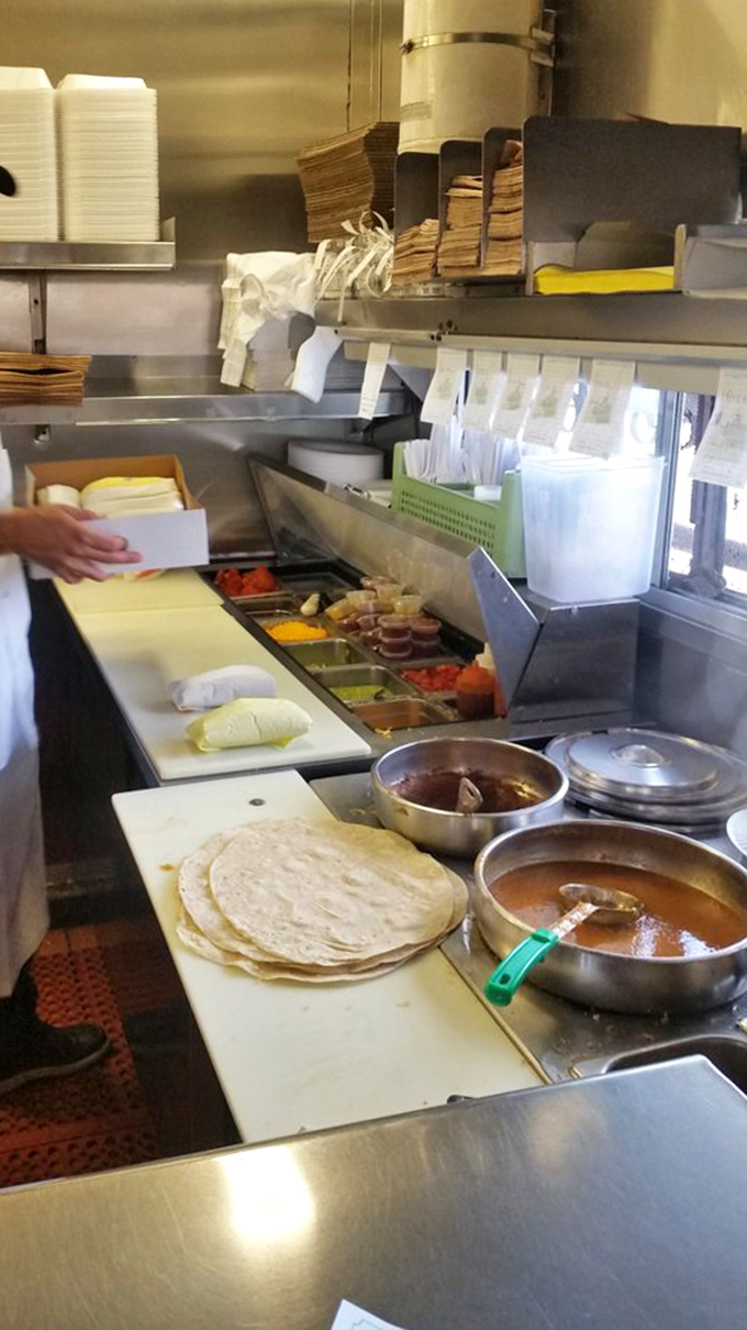 The assembly line where magic happens. Fresh ingredients waiting their turn to become part of someone's cherished food memory.