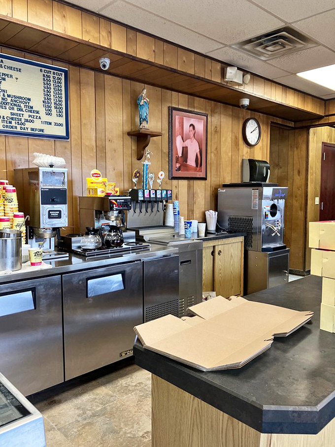 The working heart of Biagio's&mdash;where soda machines meet pizza boxes in a symphony of no-frills functionality. This is where the magic happens.