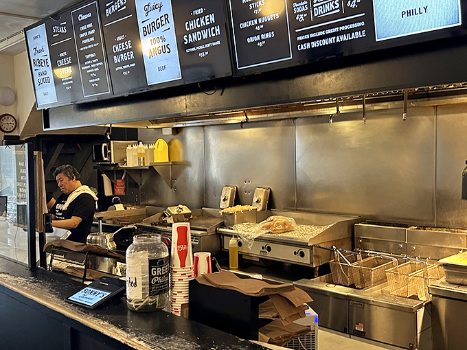 Where the magic happens. No smoke and mirrors, just honest cooking on well-seasoned grills that have seen thousands of cheesesteaks.