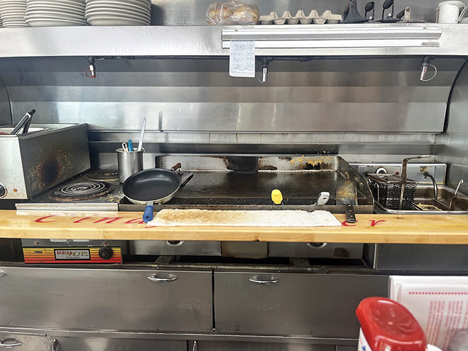 The battlefield where breakfast dreams come true&mdash;a well-seasoned flat-top grill that's seen more morning action than most of us ever will.