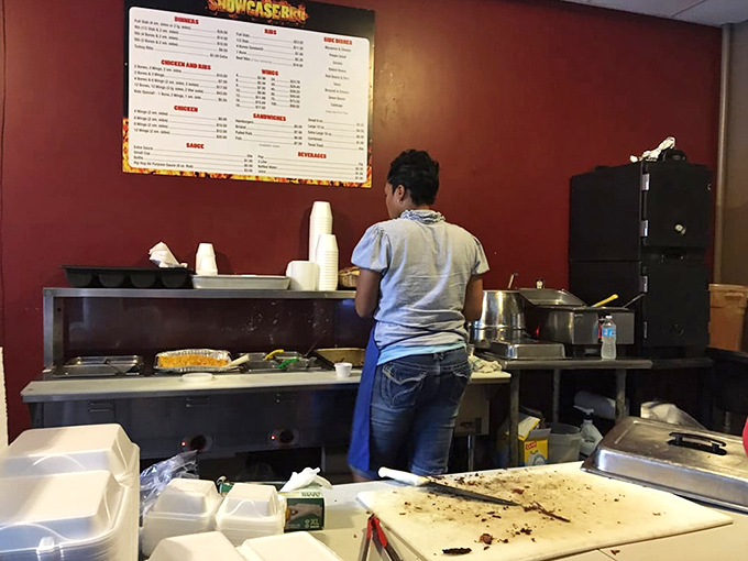 Behind the scenes where smoke and patience transform ordinary cuts into extraordinary barbecue. The magic happens in plain sight.