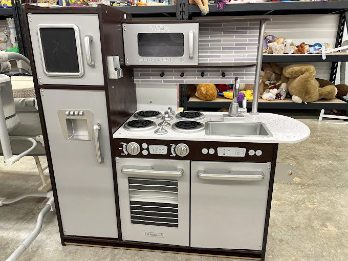 A play kitchen that's nicer than my first apartment. Teaching kids the joy of cooking without the risk of actual flames&mdash;parenting win!