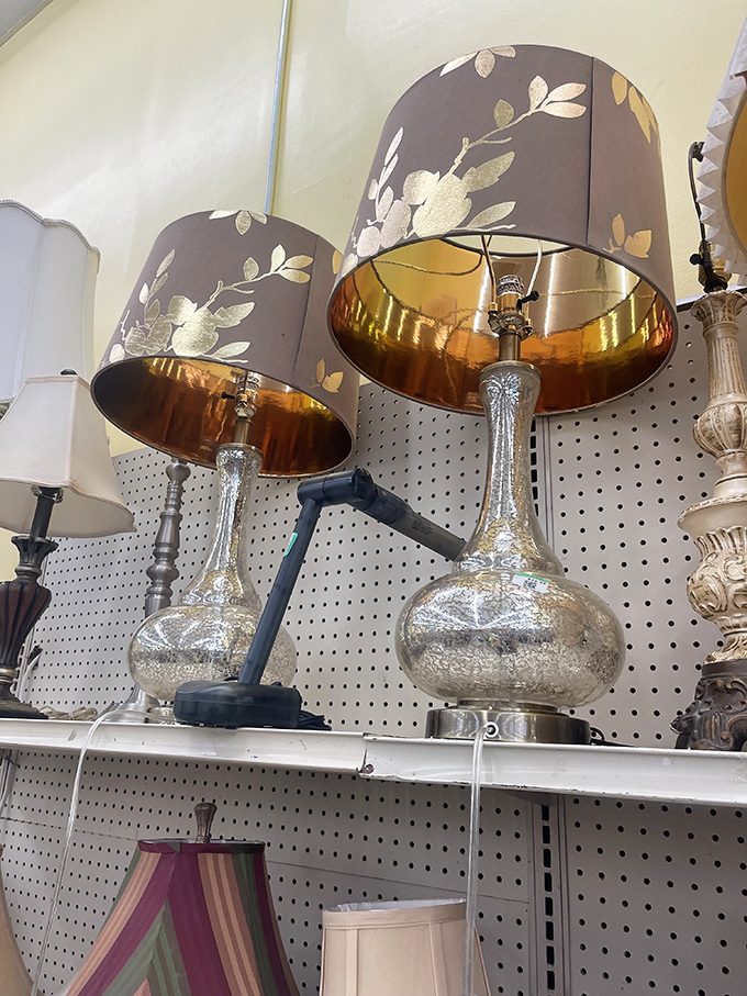 Elegant lamps with gold-lined shades stand at attention. Turn one on and transform any room from "just moved in" to "been here forever."