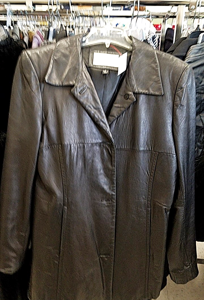 The leather jacket of your dreams hangs patiently, waiting for its second act. Previous owner's cool factor included at no extra charge.